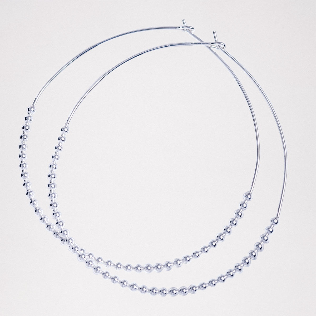 ONOMATOPEE SILVER PUCHI HOOP EARRING I JEWELRY NiMi Projects